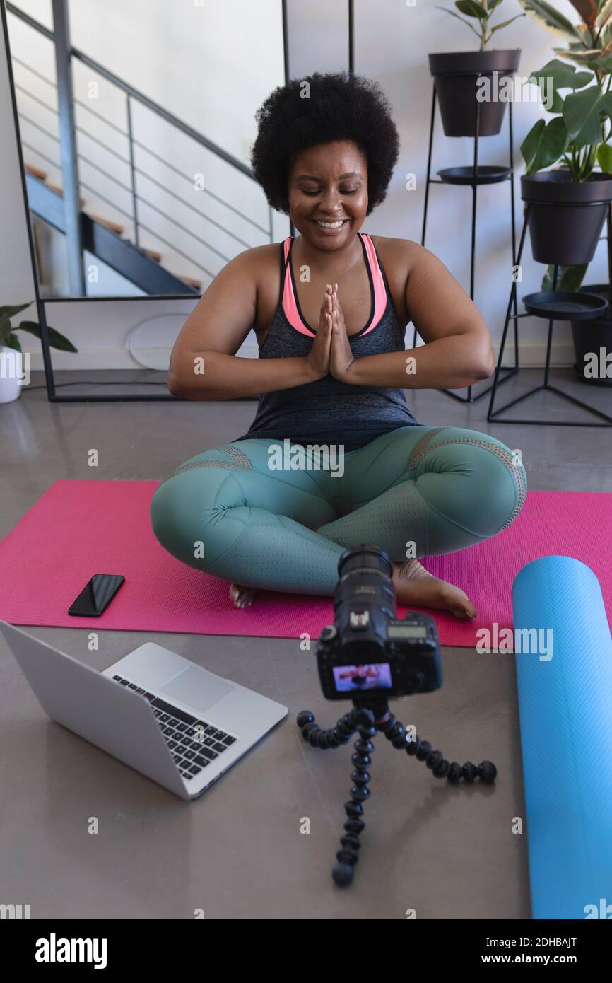 African american female vlogger recording a video Stock Photo - Alamy