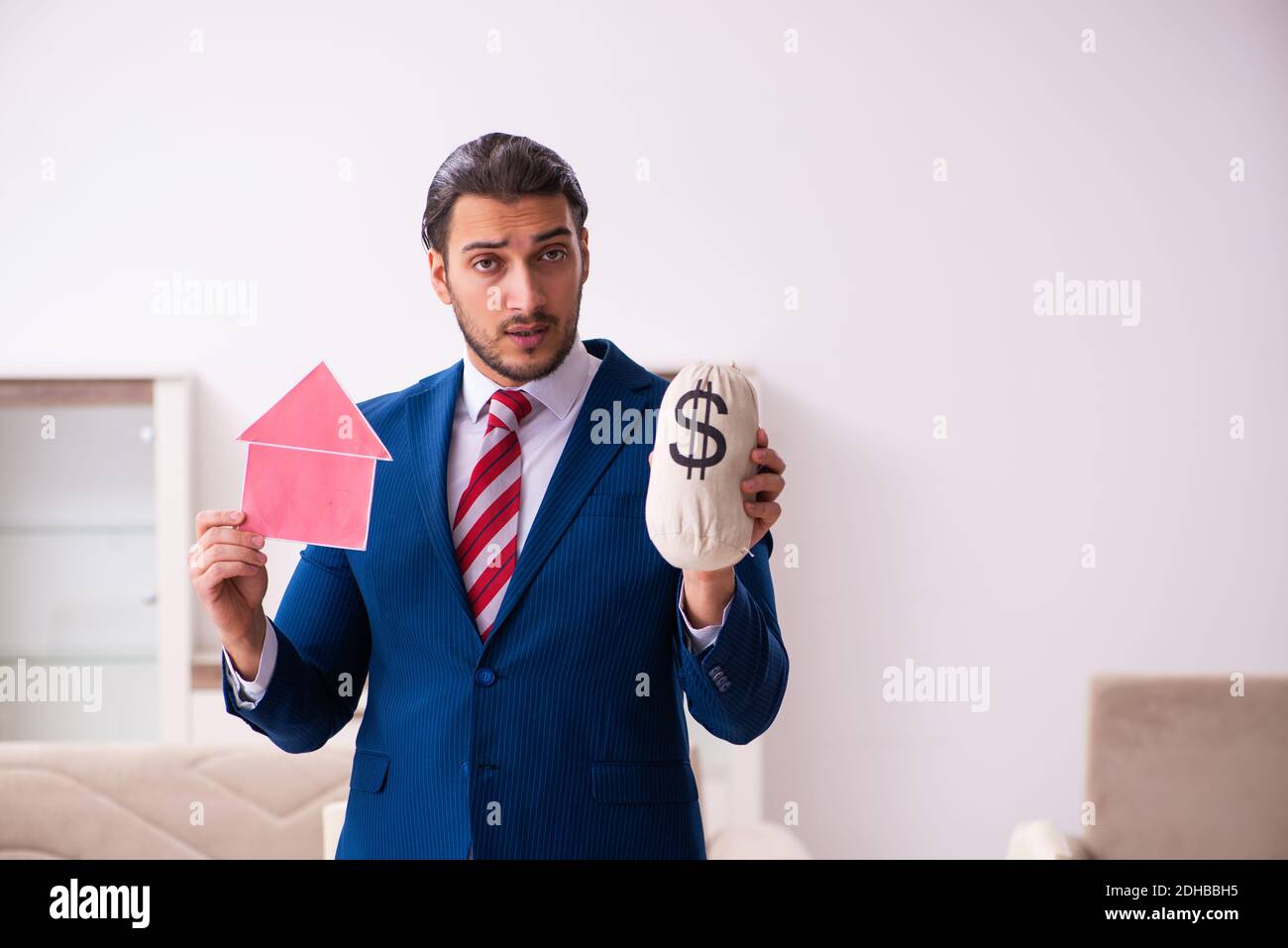 Male realtor presenting showing hi-res stock photography and images - Alamy
