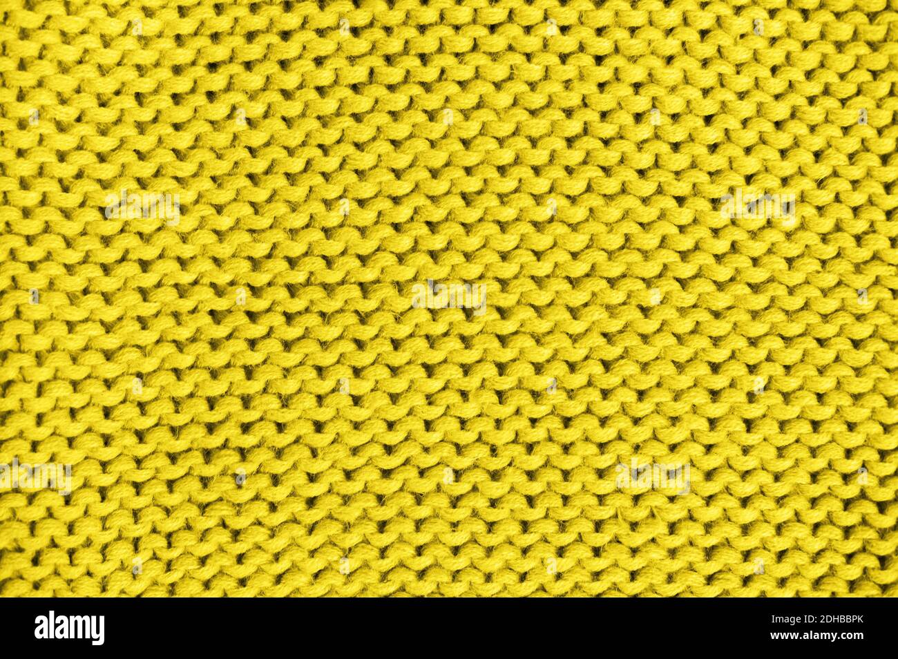 Yellow knitted texture. Wool yarn in knitting background Stock Photo ...