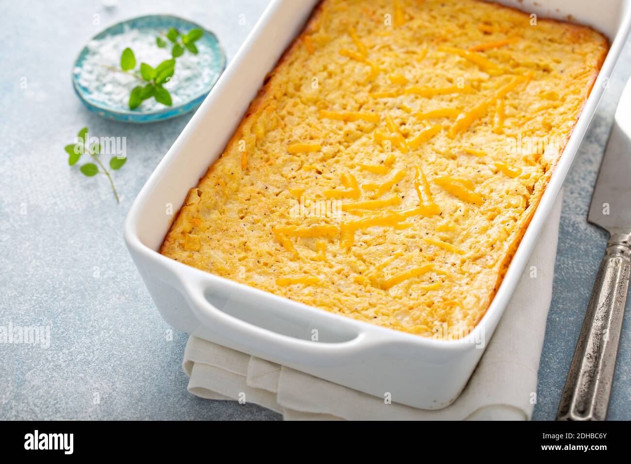 Cheesy cornbread freshly baked in a pan Stock Photo - Alamy