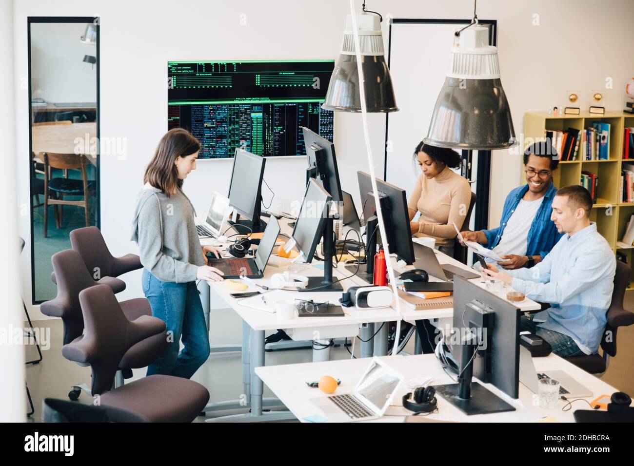 Men working at their desks hi-res stock photography and images - Alamy