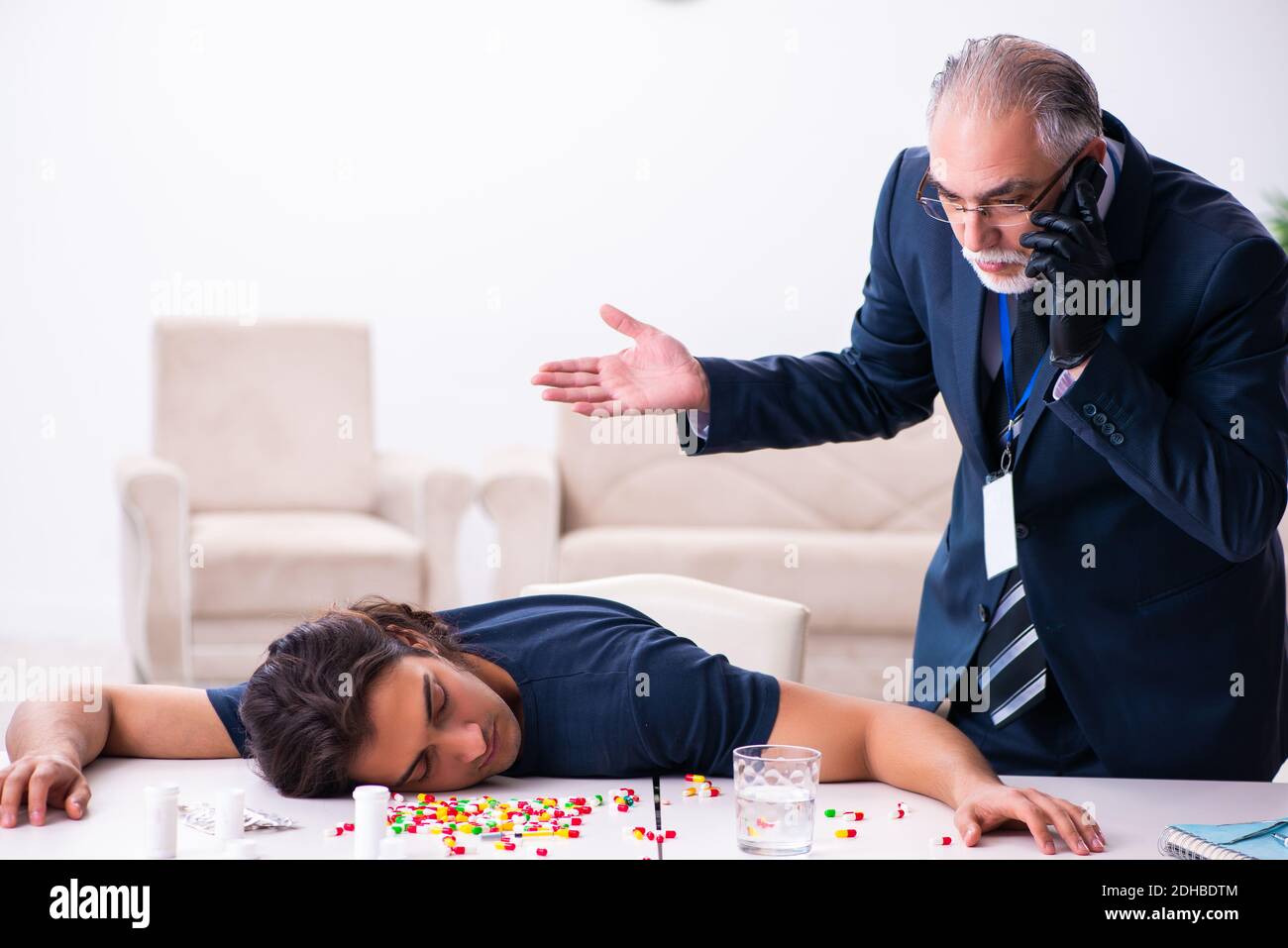 Old male forensic expert at crime scene Stock Photo - Alamy