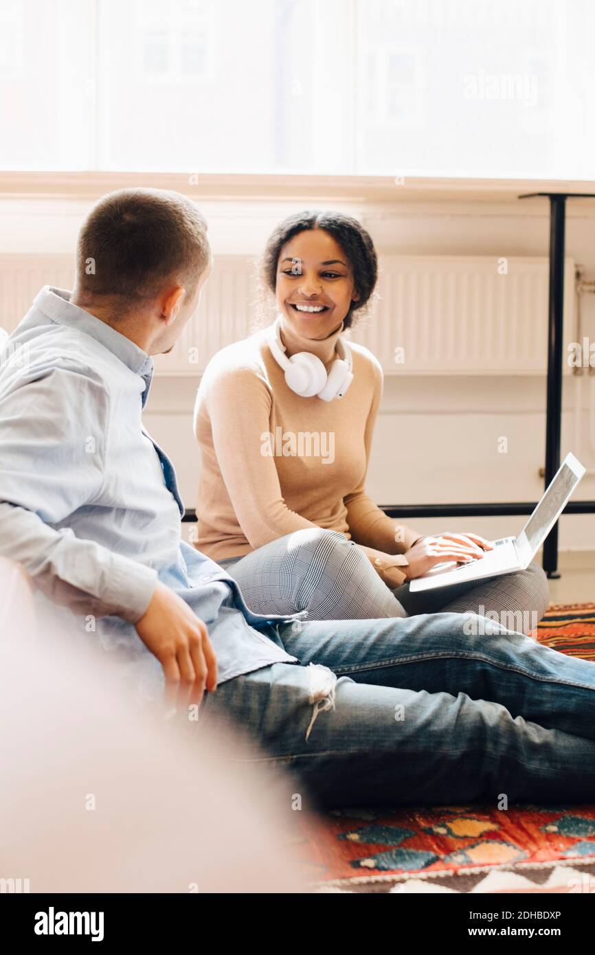 Engineer holding laptop colleague hi-res stock photography and images ...