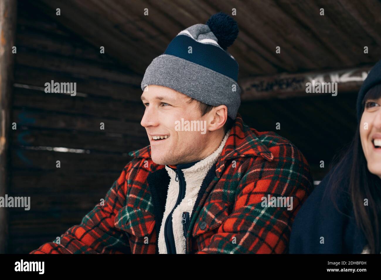 Woman sitting in log cabin hi-res stock photography and images - Alamy