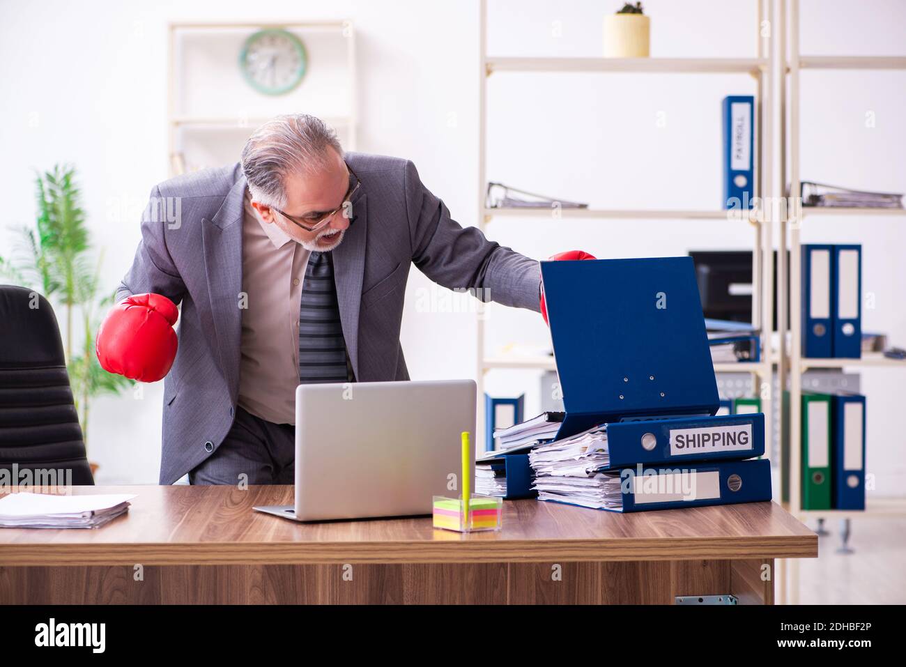 Businessman angry and furious at the workplace Stock Photo - Alamy