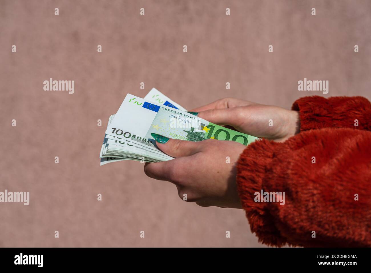 Hand holding and showing euro money or giving money. World money ...