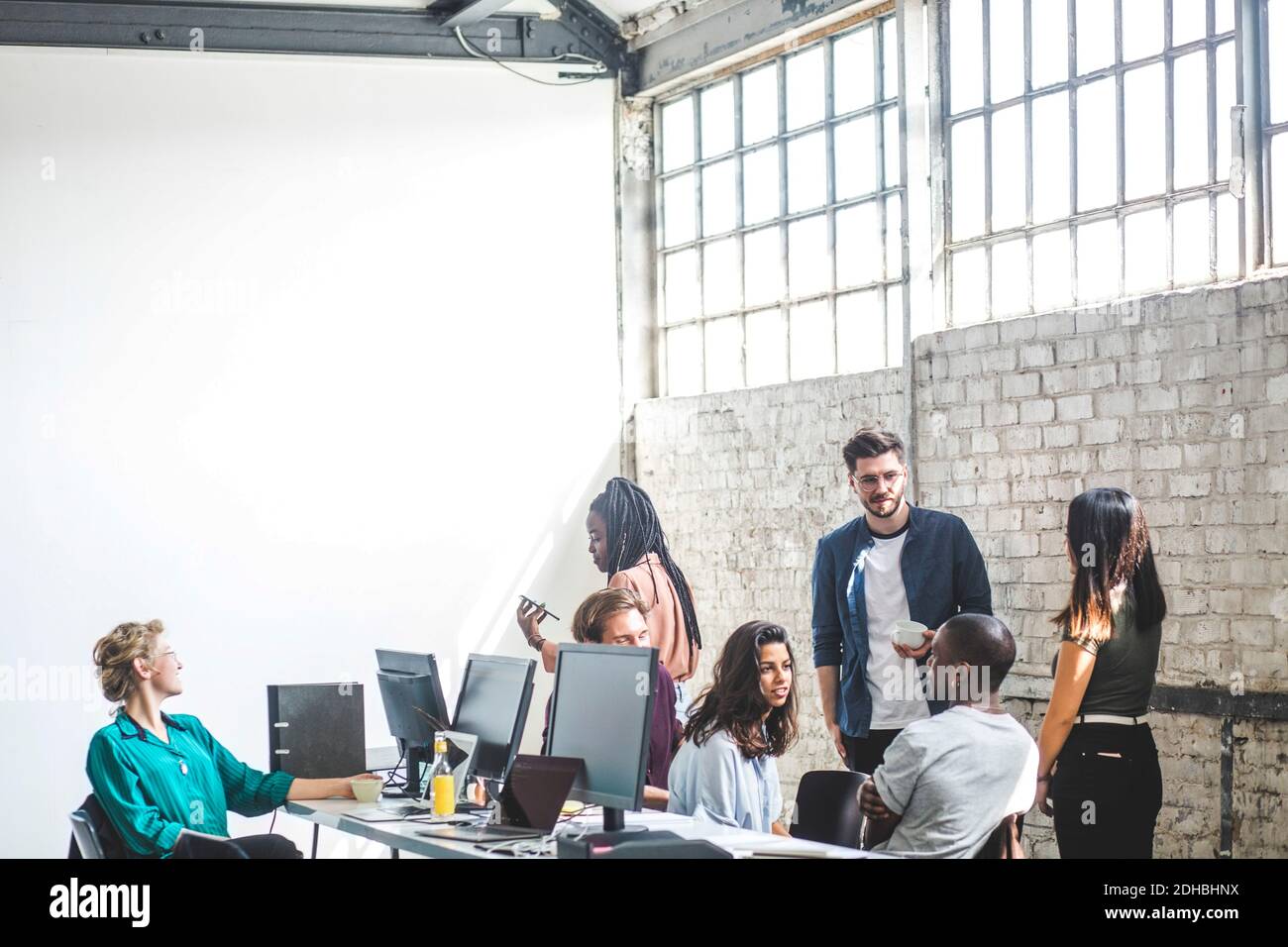 Team of computer hackers working on new IT project at workplace Stock ...