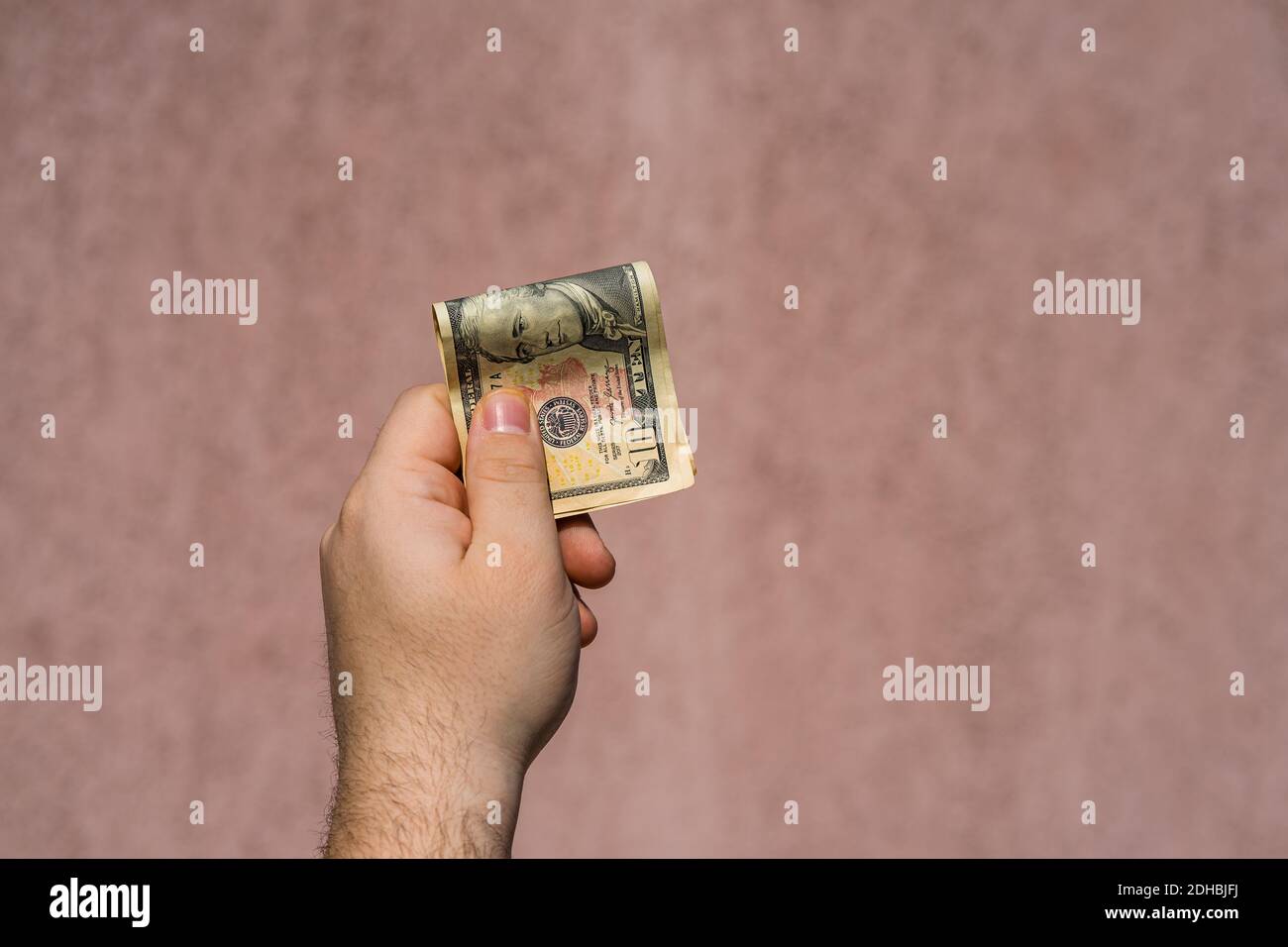 Hand holding showing dollars money and giving or receiving money like ...