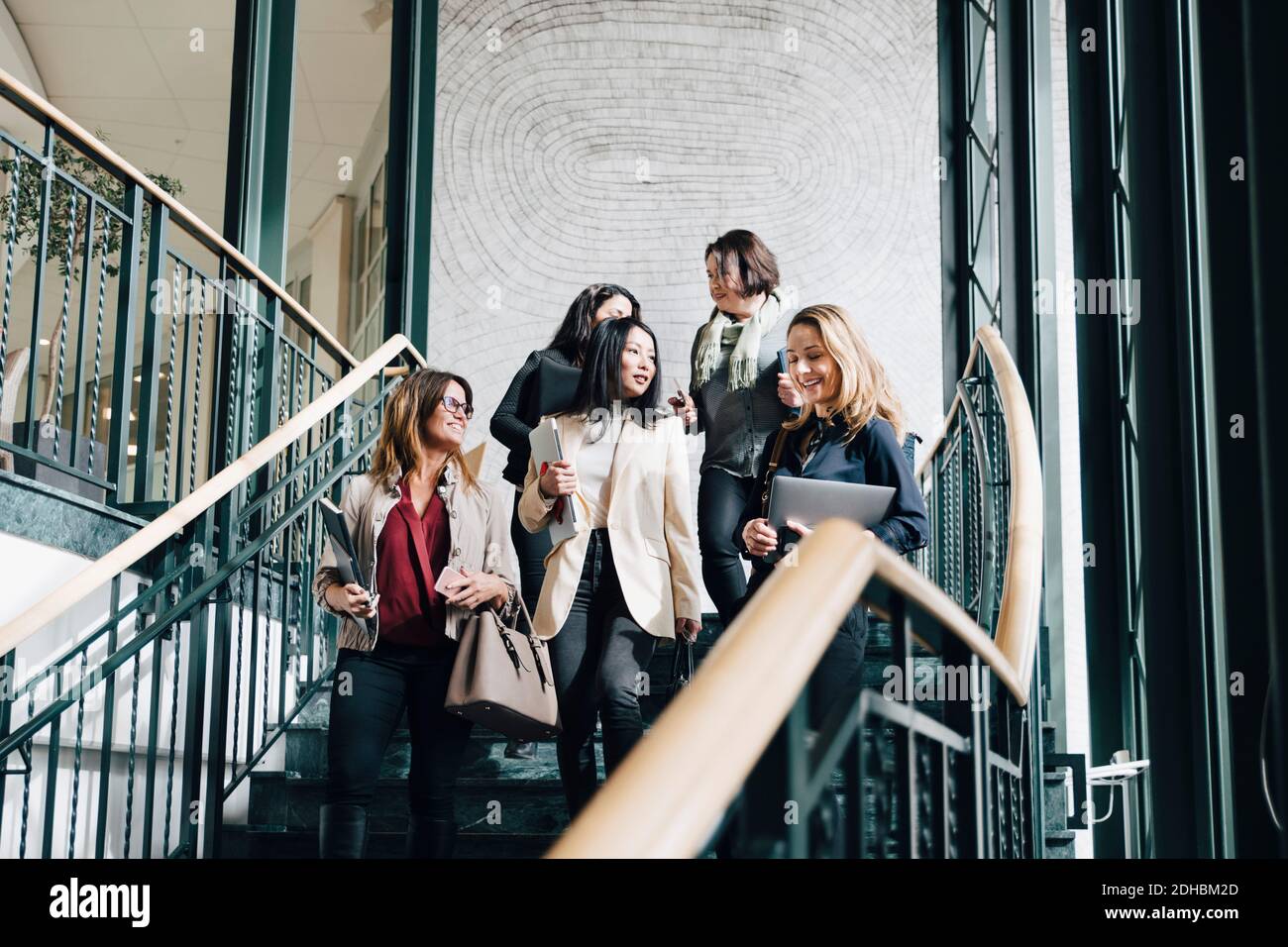 Staircase looking down female hi-res stock photography and images - Alamy