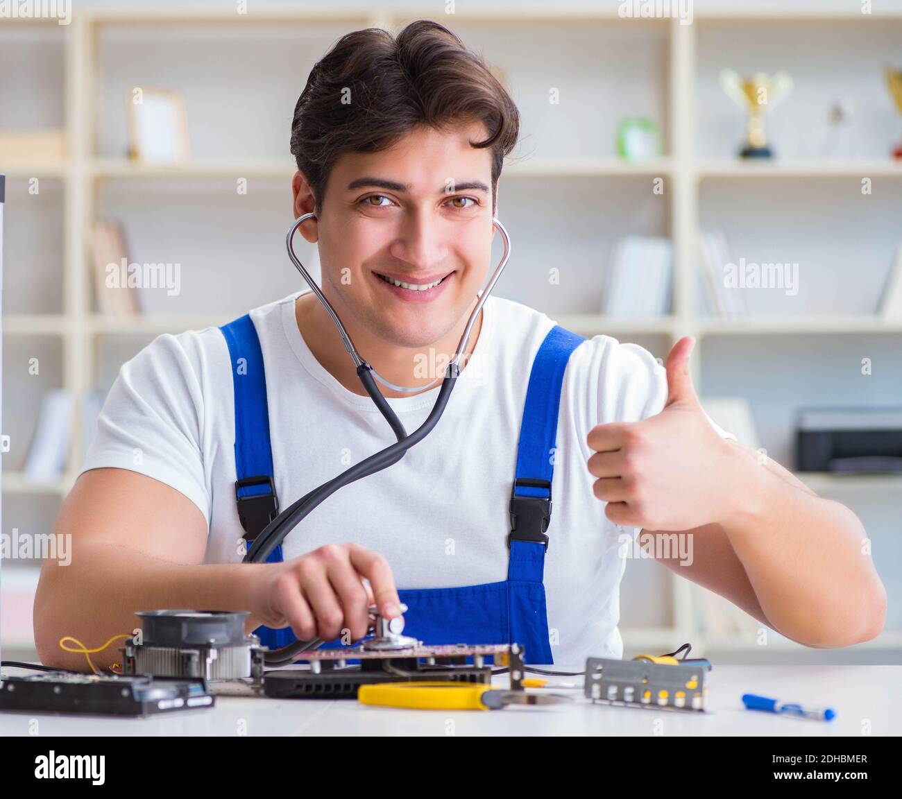Computer repairman repairing desktop computer Stock Photo - Alamy