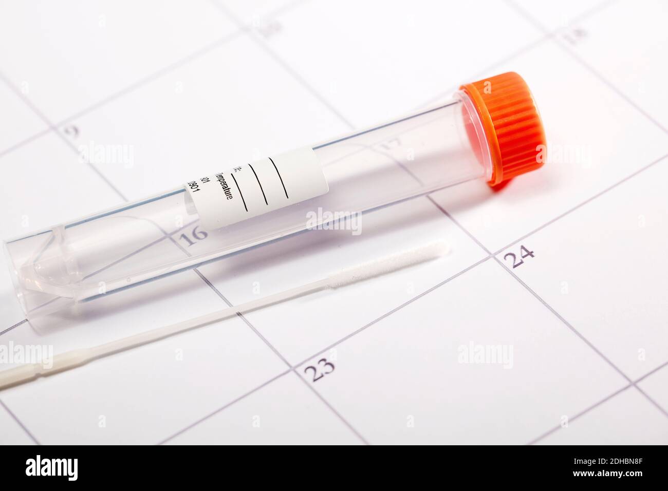 Rapid test kit, vial with orange cap and swab, sticker for patient data ...