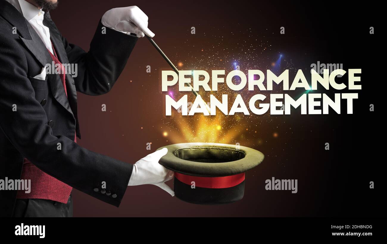 Illusionist is showing magic trick with PERFORMANCE MANAGEMENT ...