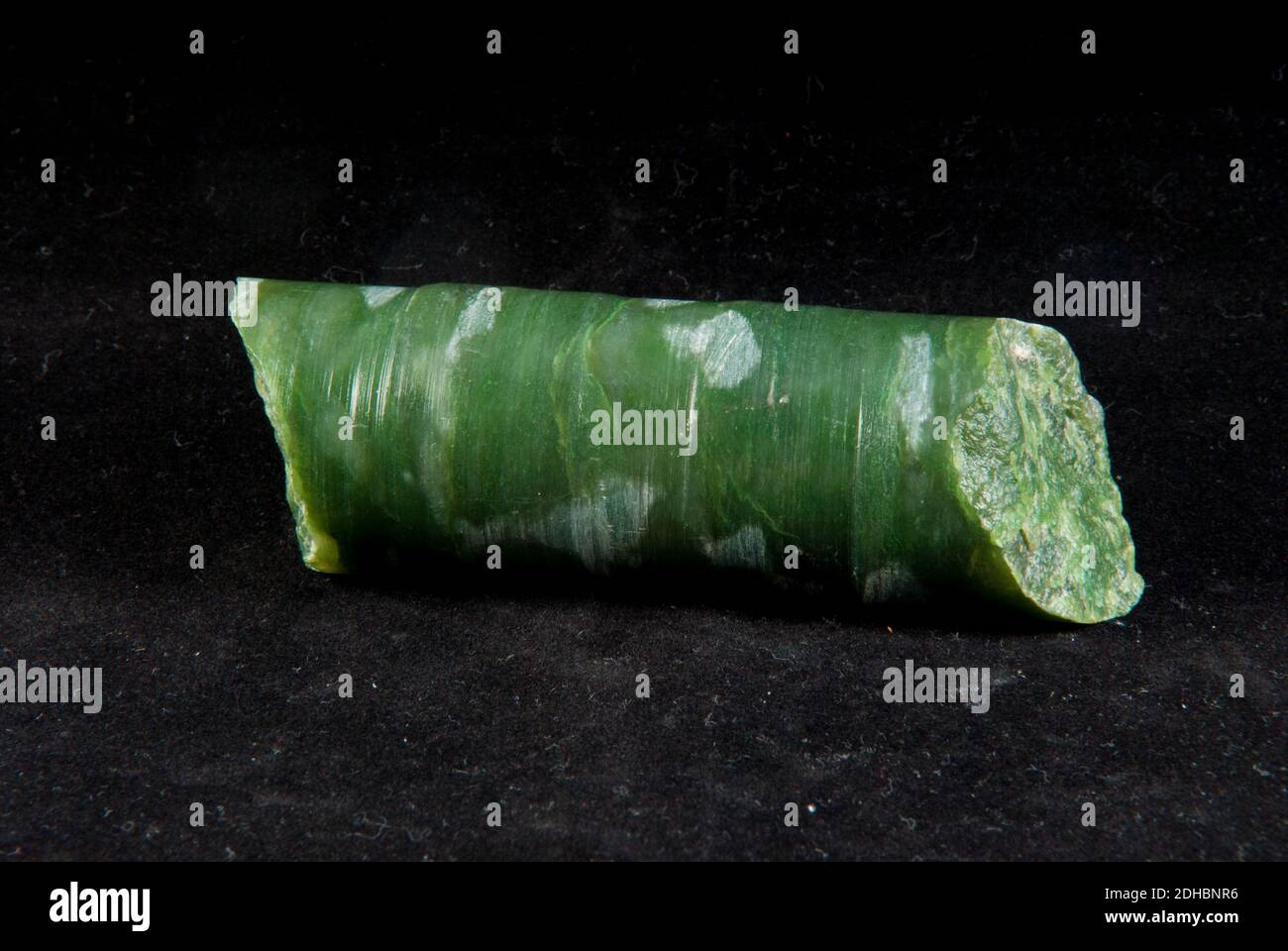 jade core sample on a black background Stock Photo - Alamy