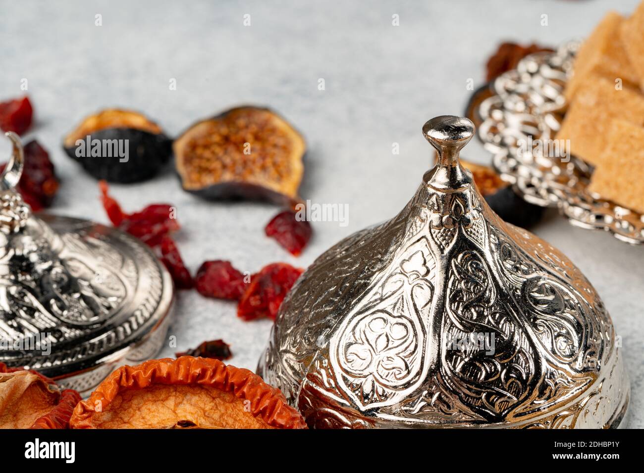 Arabic metal dishware and dry fruits on table Stock Photo - Alamy