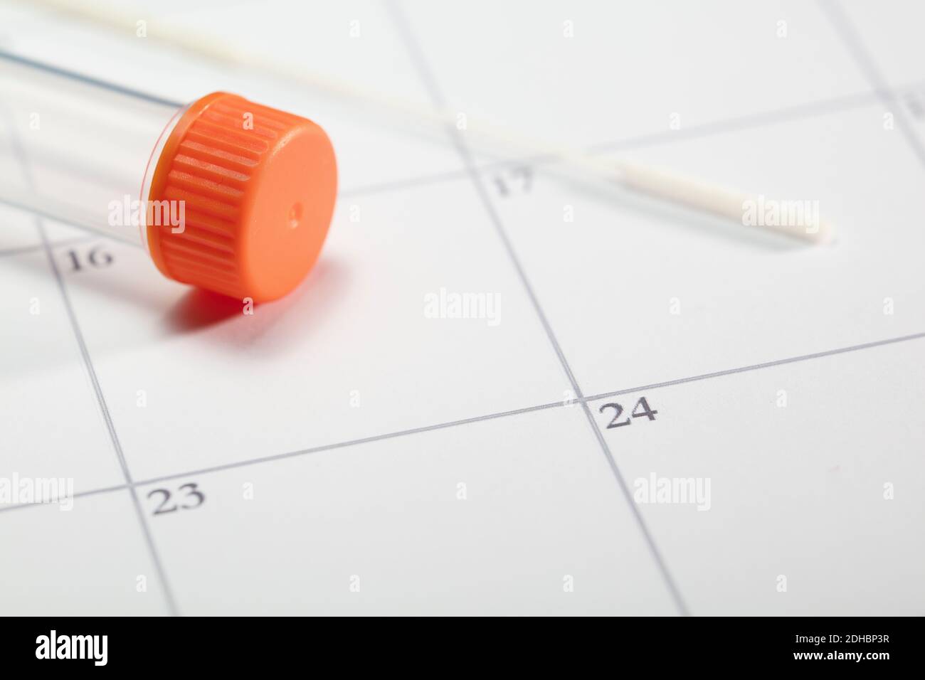 Rapid test kit, vial with orange cap and swab, sticker for patient data ...