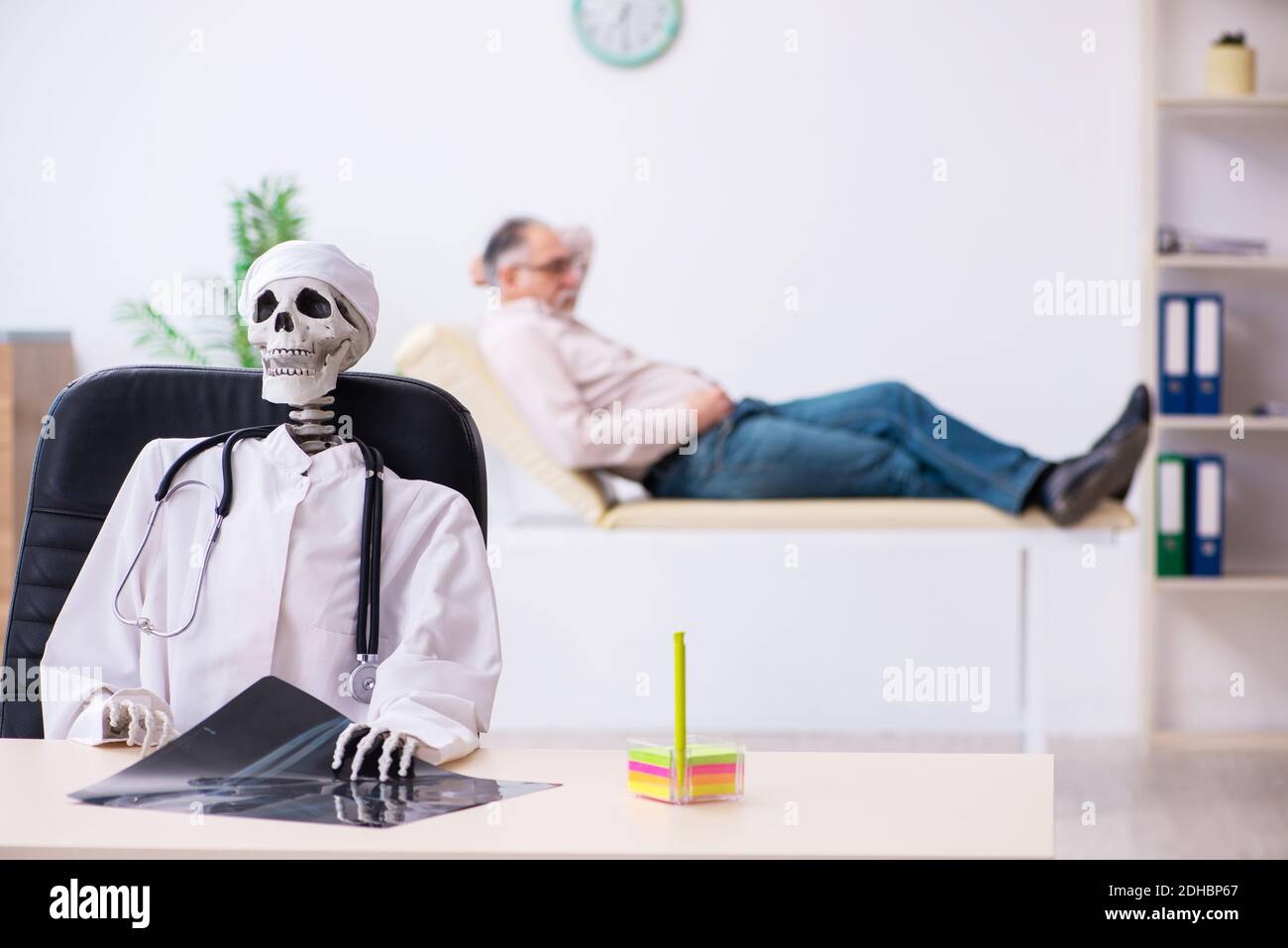 Old man visiting dead doctor radiologist Stock Photo - Alamy