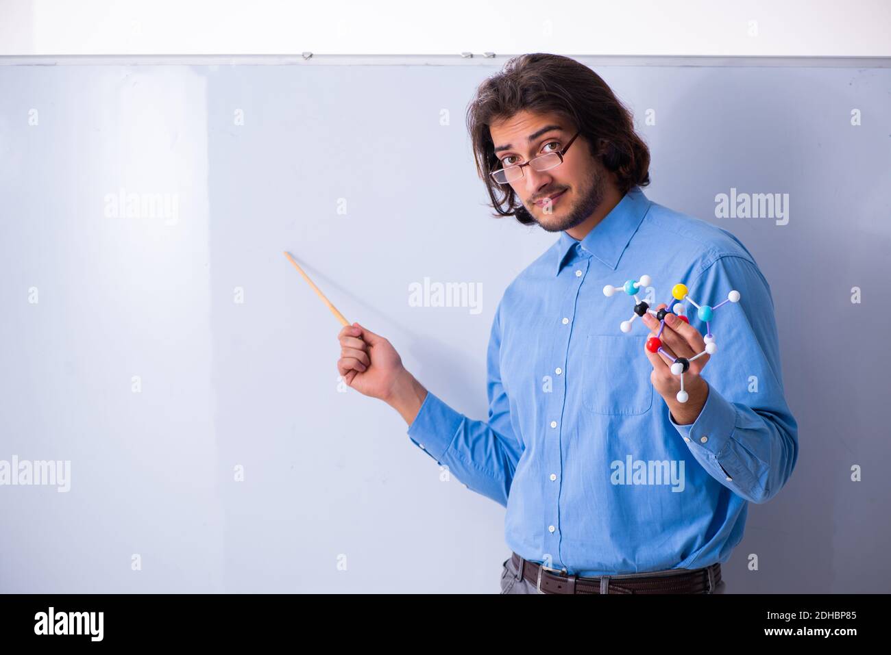 Physics teacher explaining molecule hi-res stock photography and images ...