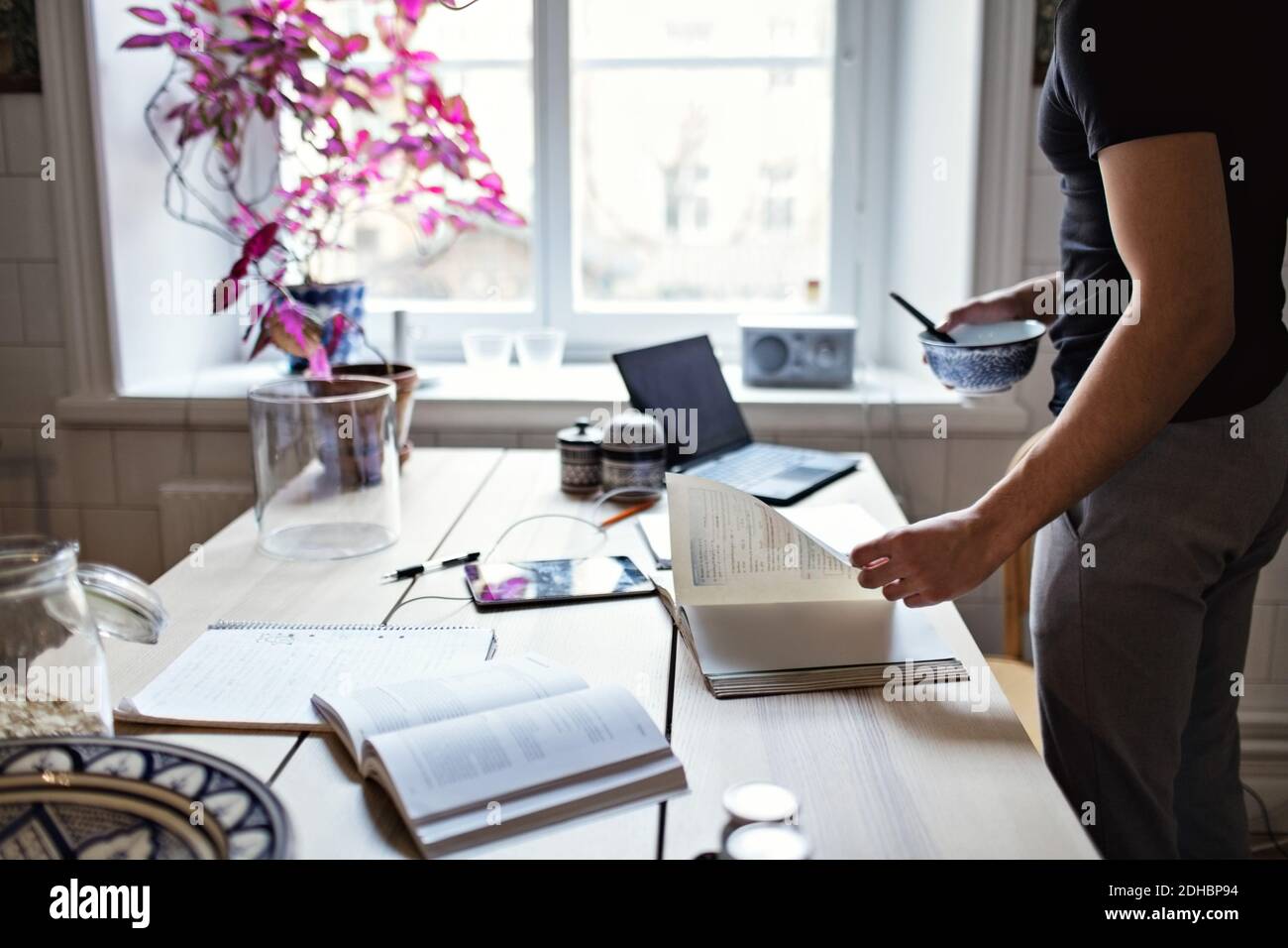 One holding book hi-res stock photography and images - Alamy