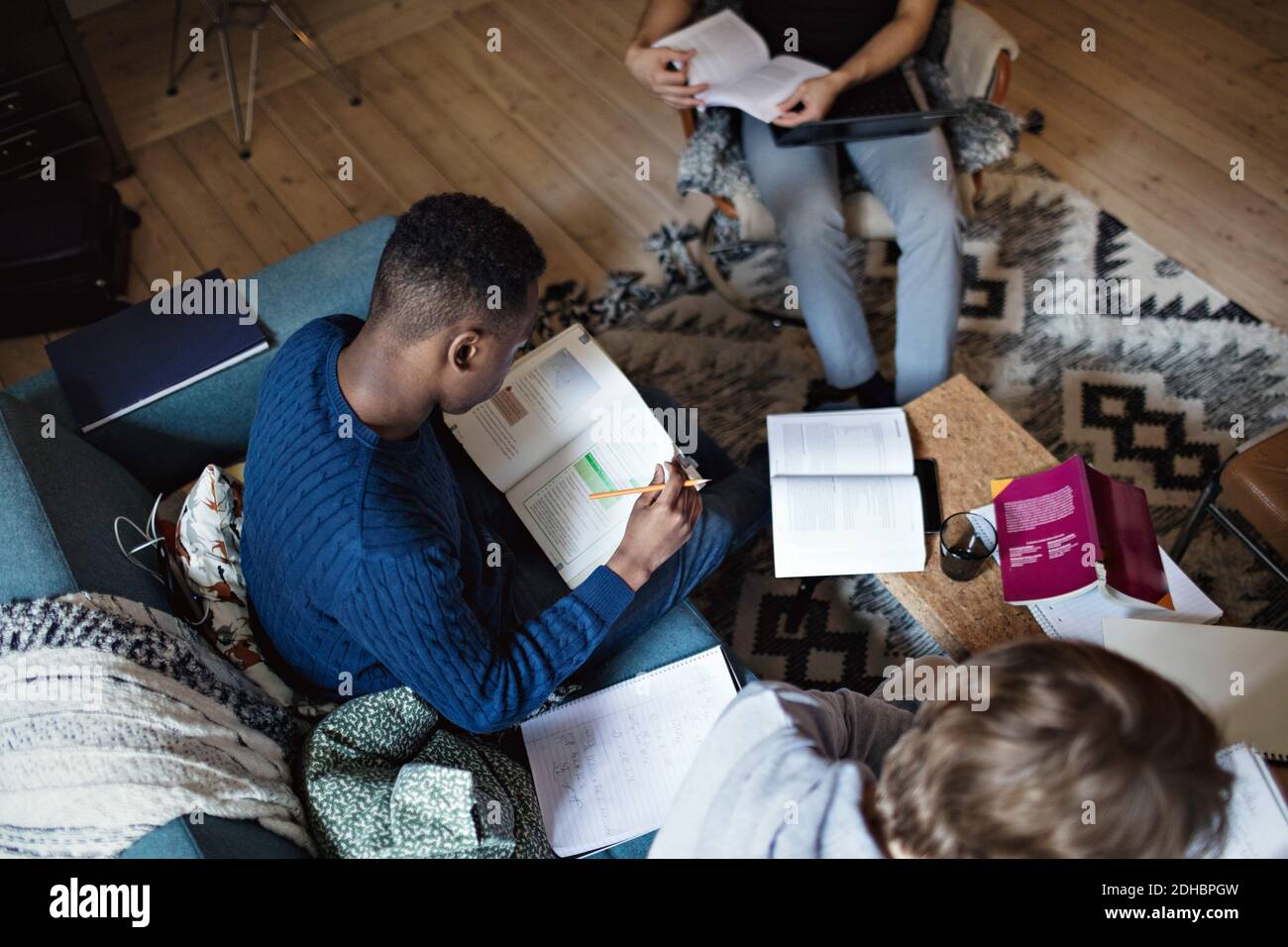 Studious young men hi-res stock photography and images - Alamy