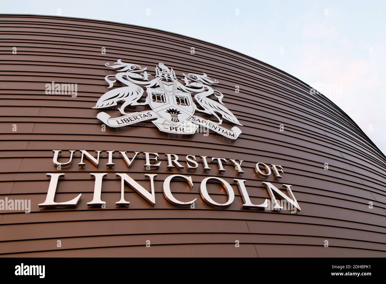 The university sign on the exterior of the Isaac Newton building in the ...