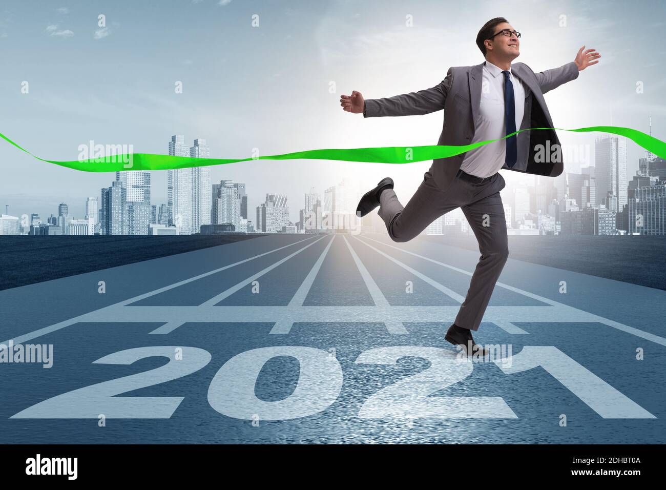 Businessman crossing finish line success achievement hi-res stock ...