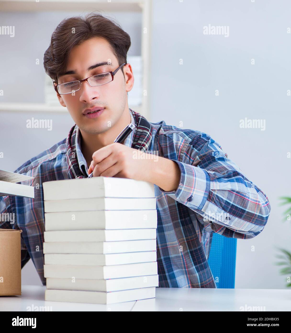 Writer presenting his books to public Stock Photo - Alamy
