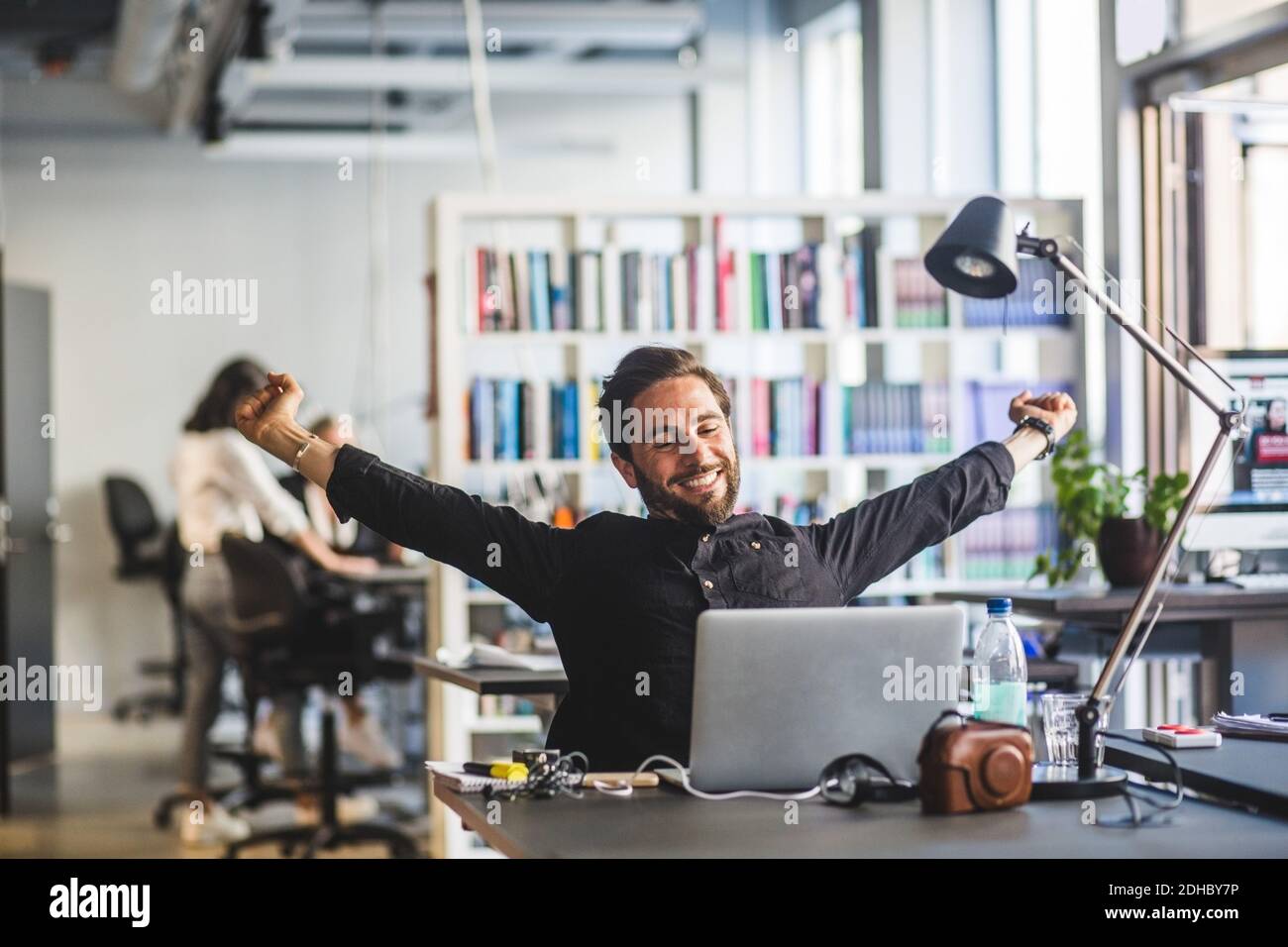 Desk sitting arms on desk hi-res stock photography and images - Alamy