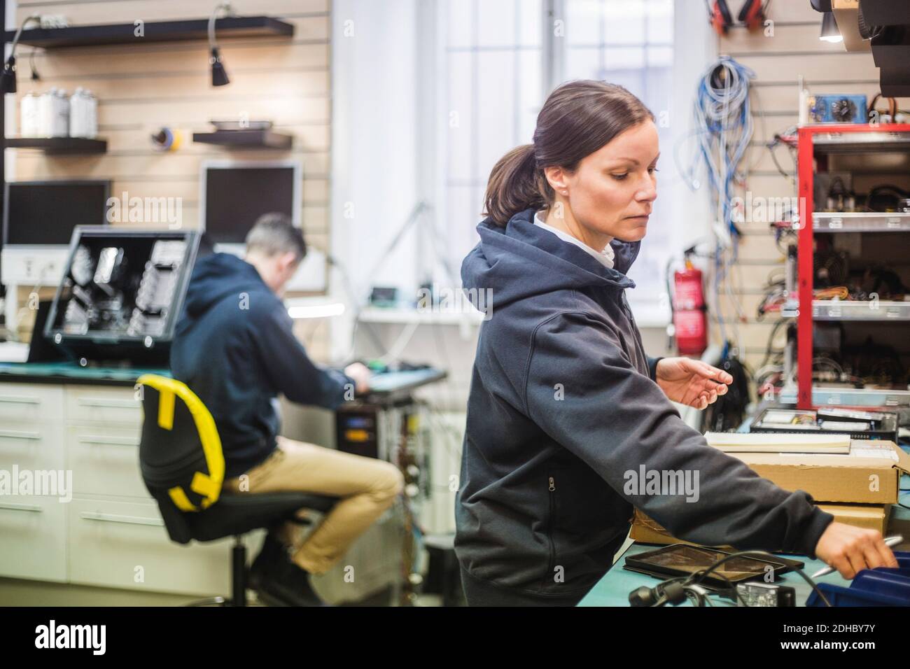 Technicians working in computer store Stock Photo - Alamy