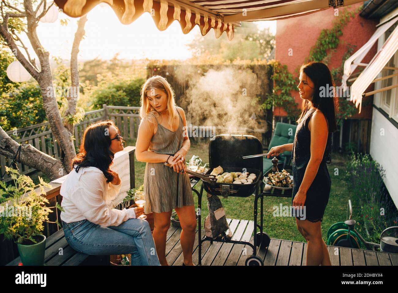 Sitting food and drink holding communication smoke hi-res stock ...