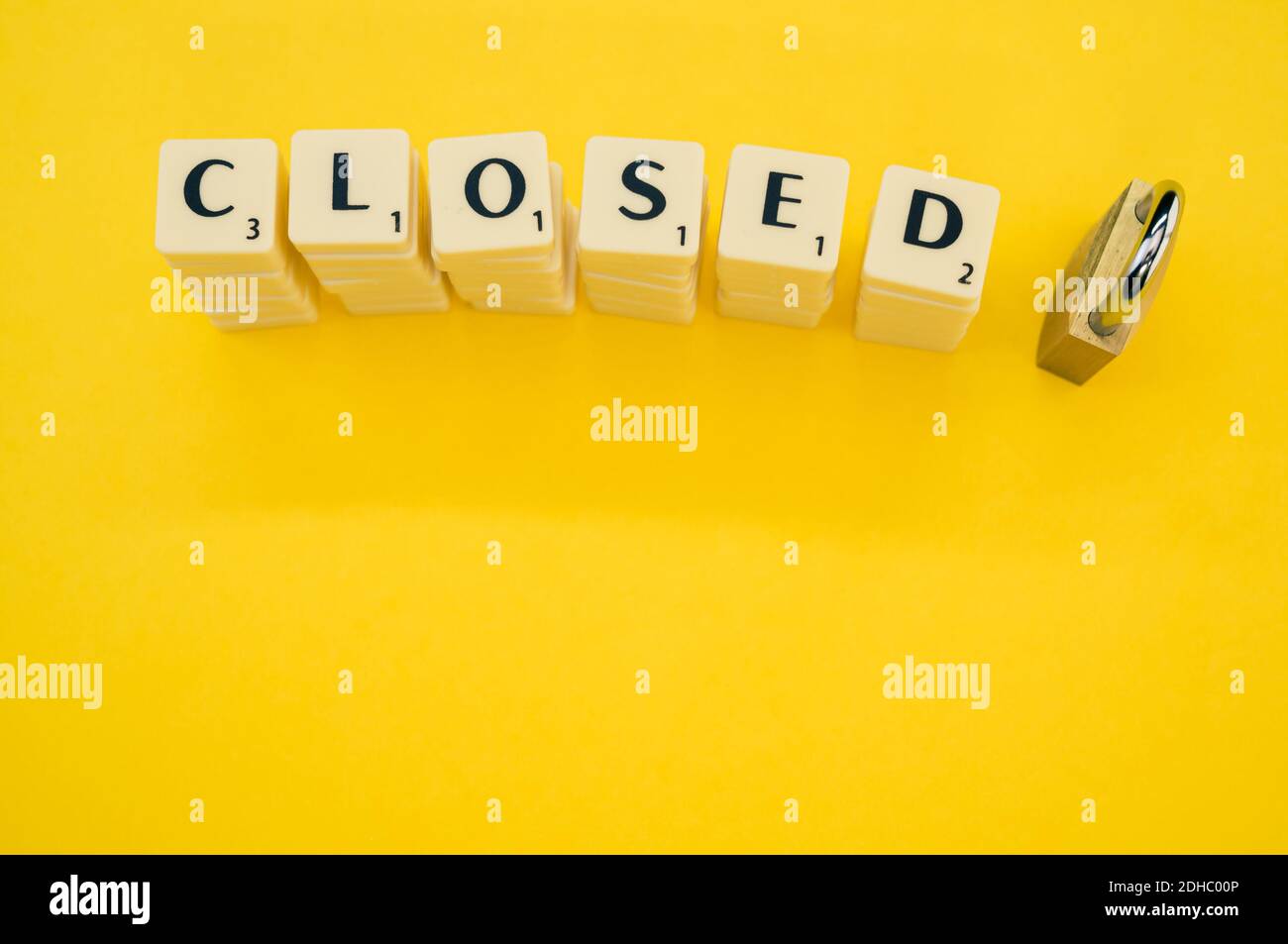 The six white letter block stacks forming the word CLOSED with a ...