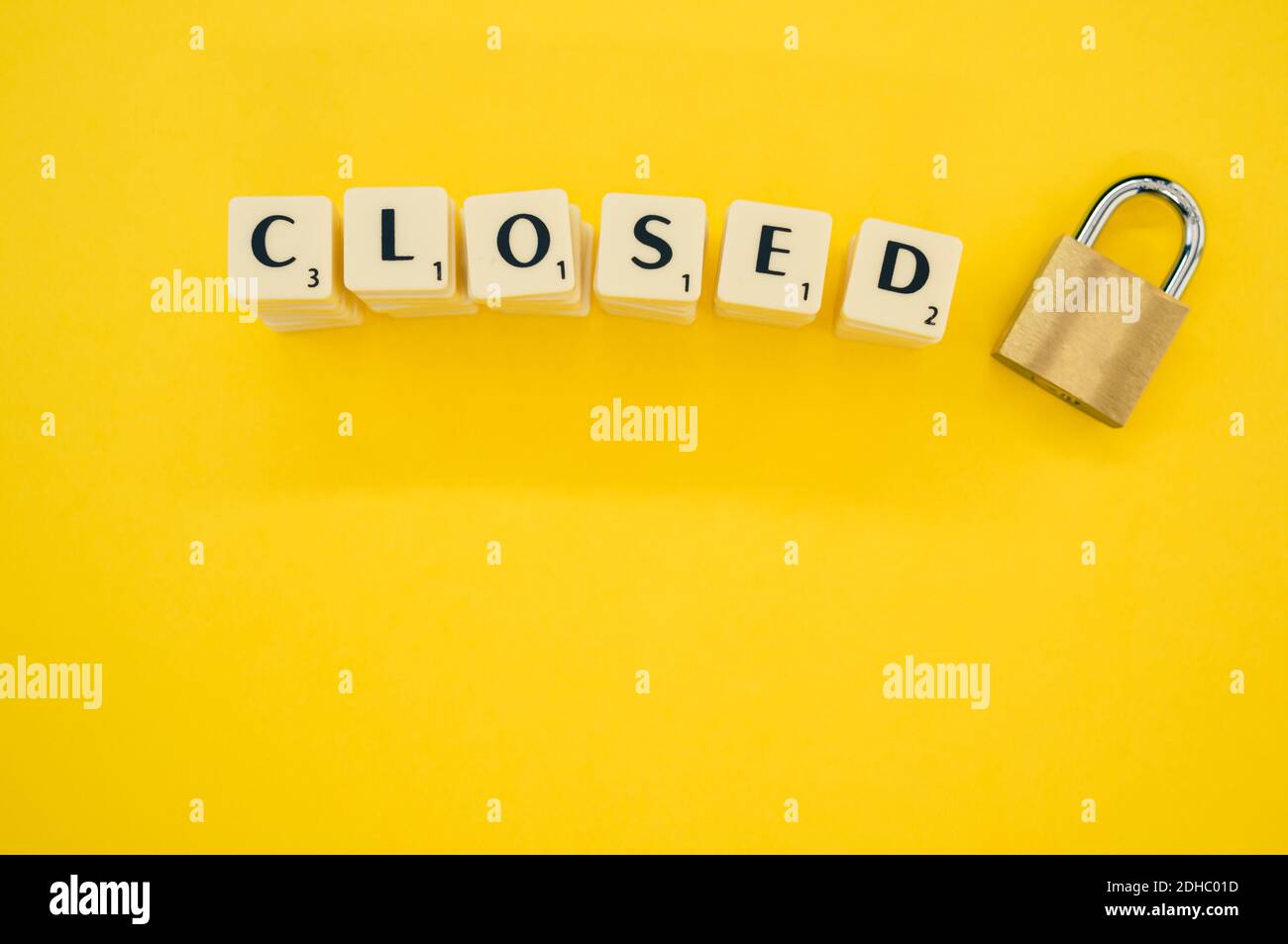 The six white letter block stacks forming the word CLOSED with a ...