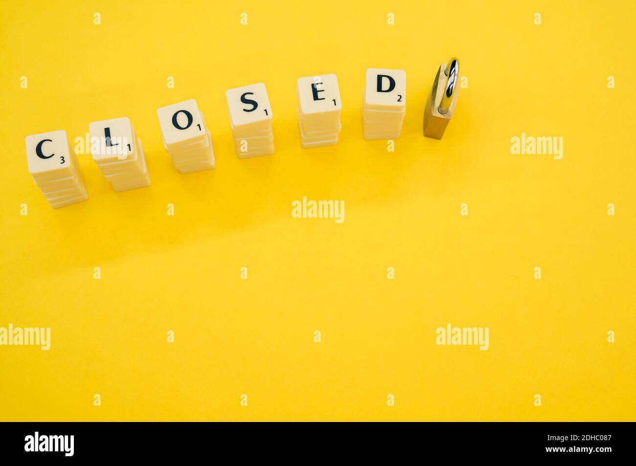 The six white letter block stacks forming the word CLOSED with a ...