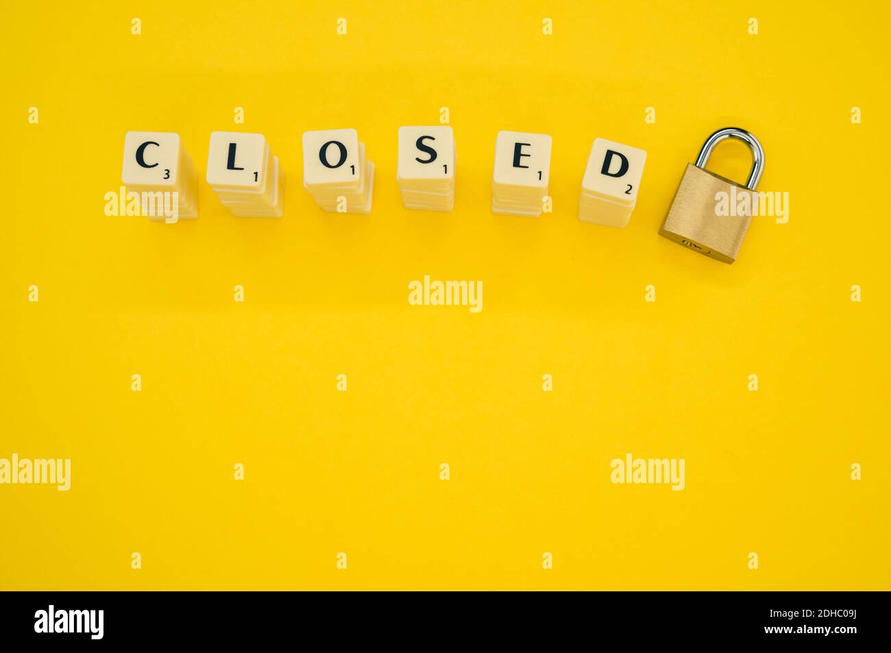 The six white letter block stacks forming the word CLOSED with a ...