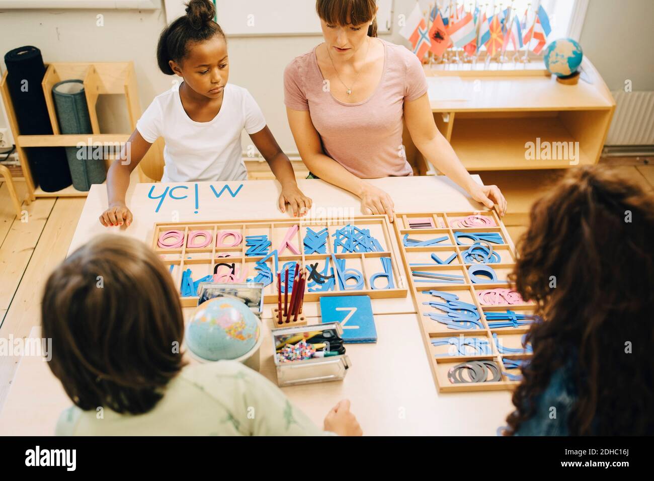 Children teacher school talking table hi-res stock photography and ...