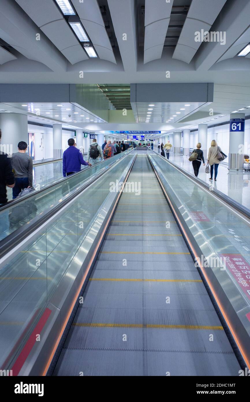 Moving walkway to departure gates at Hong Kong International Airport ...
