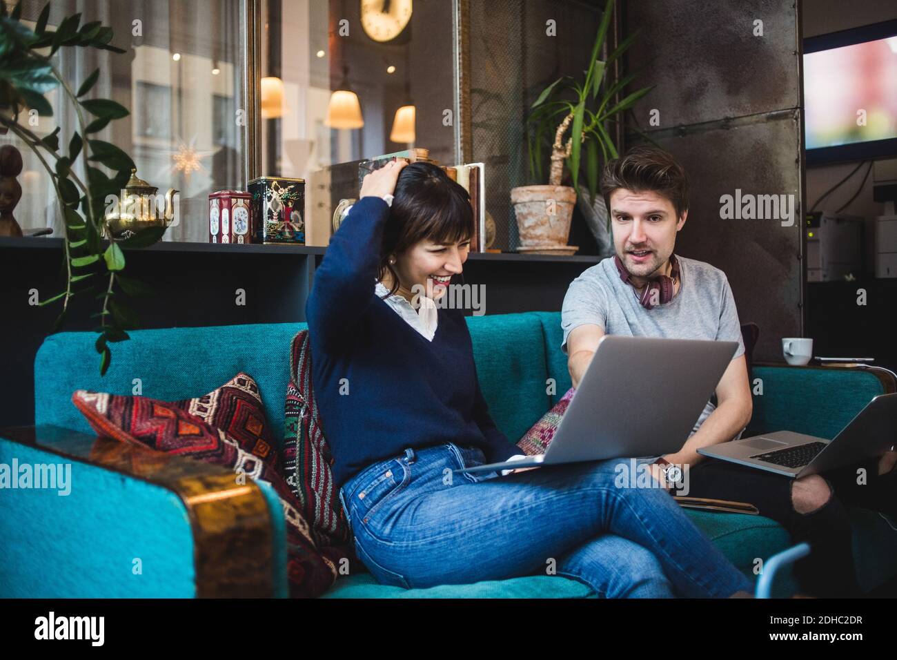 Professional sitting hi-res stock photography and images - Alamy