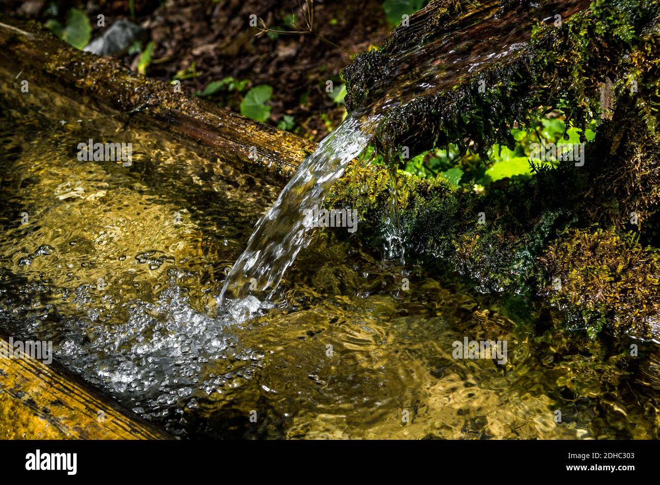 Old Mossy Spring And Fountain With Clear And Cold Mountain Water ...