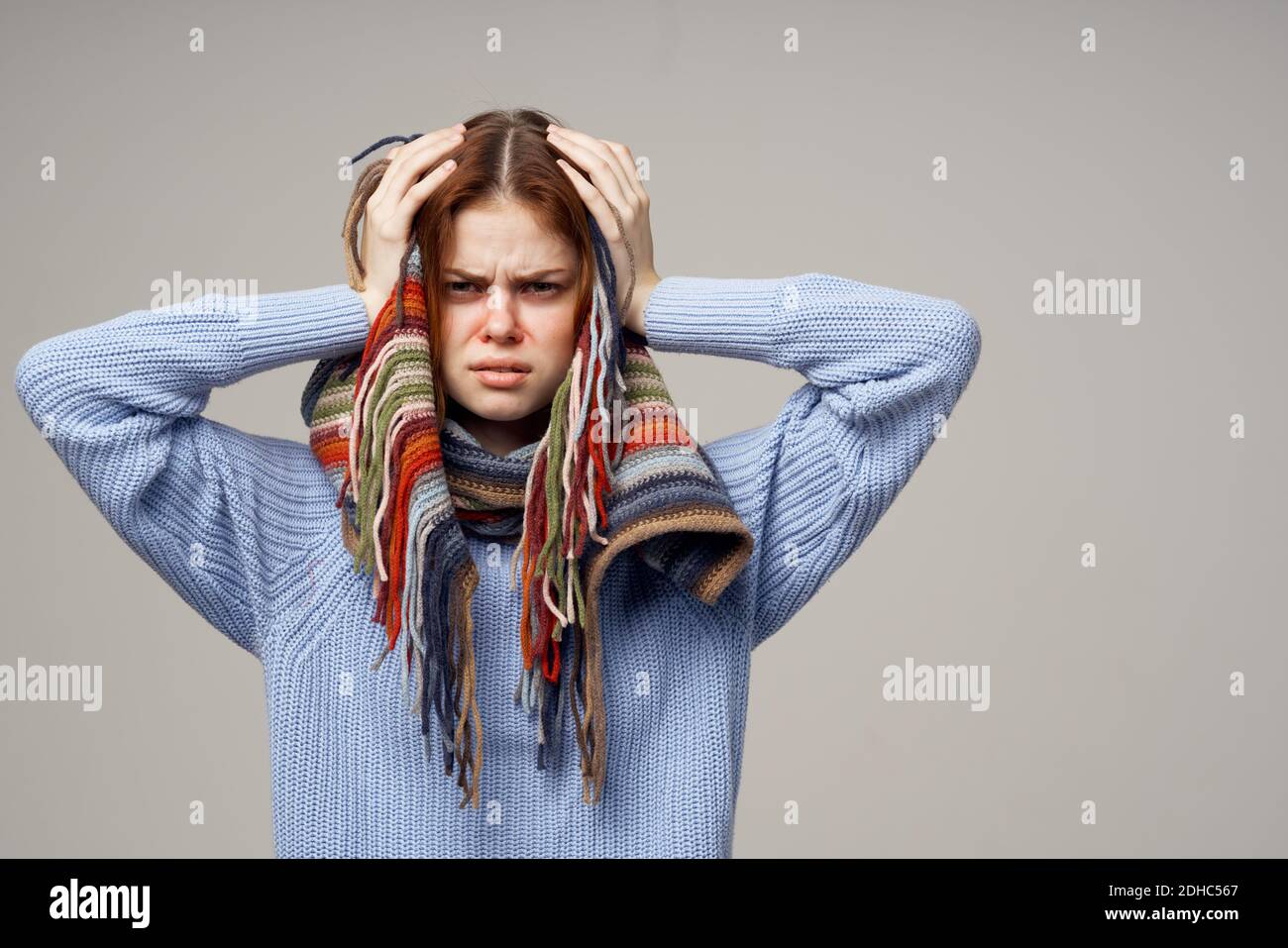 sick woman in a warm sweater and scarf health problems runny nose Stock ...