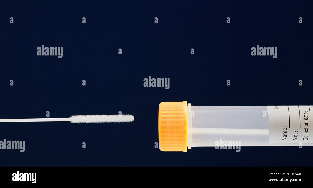 Rapid test kit, vial with orange cap and swab, sticker for patient data ...