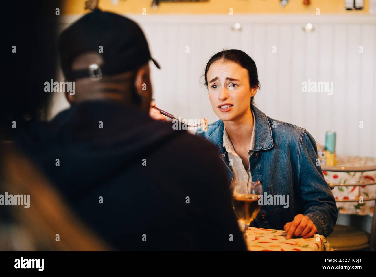 Group people sitting eating restaurant hi-res stock photography and ...