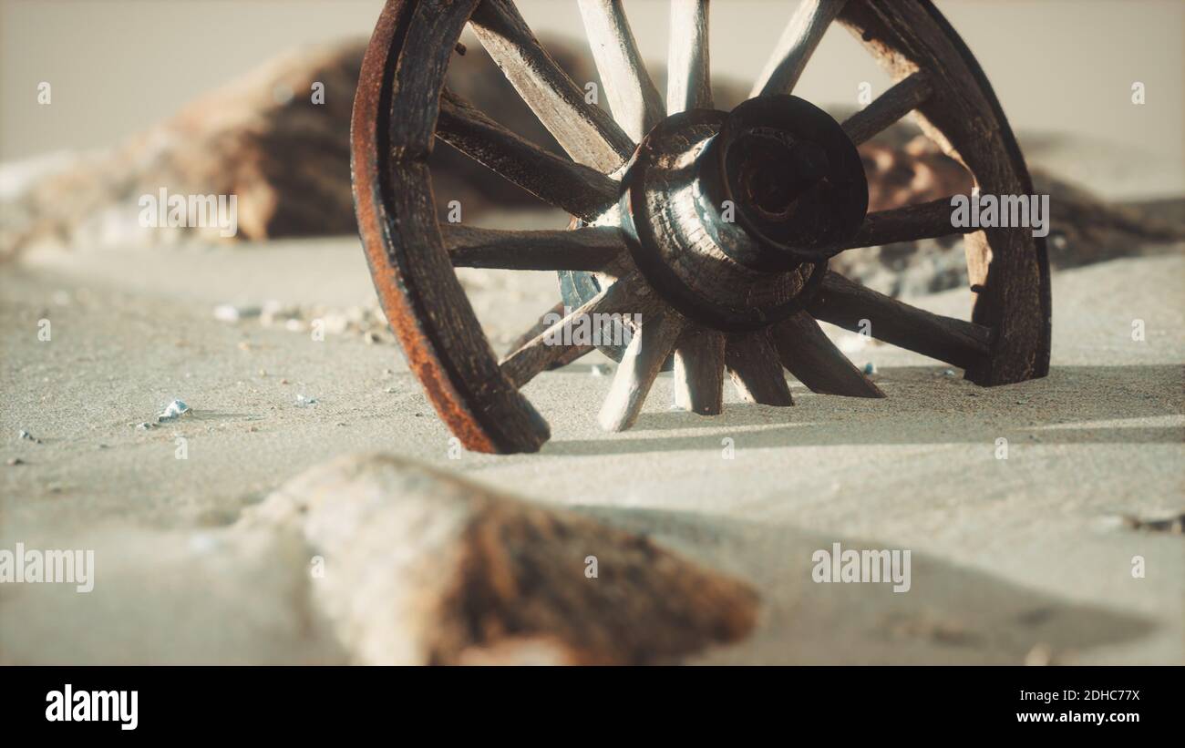 Large wooden wheel in the sand Stock Photo - Alamy