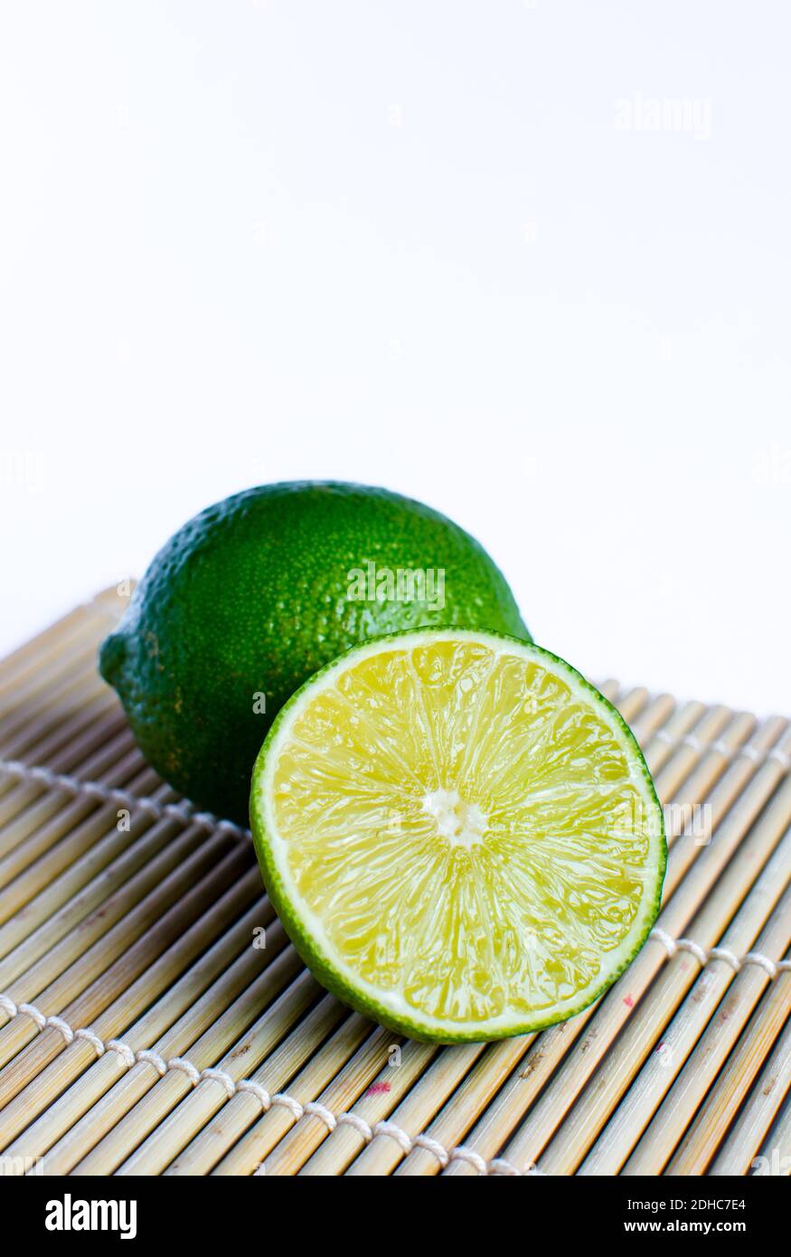 Fresh lime and slice Stock Photo - Alamy
