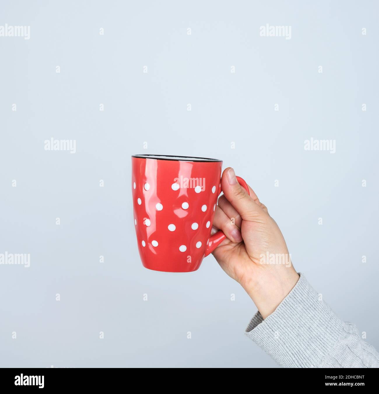 Red cup in hand hi-res stock photography and images - Alamy