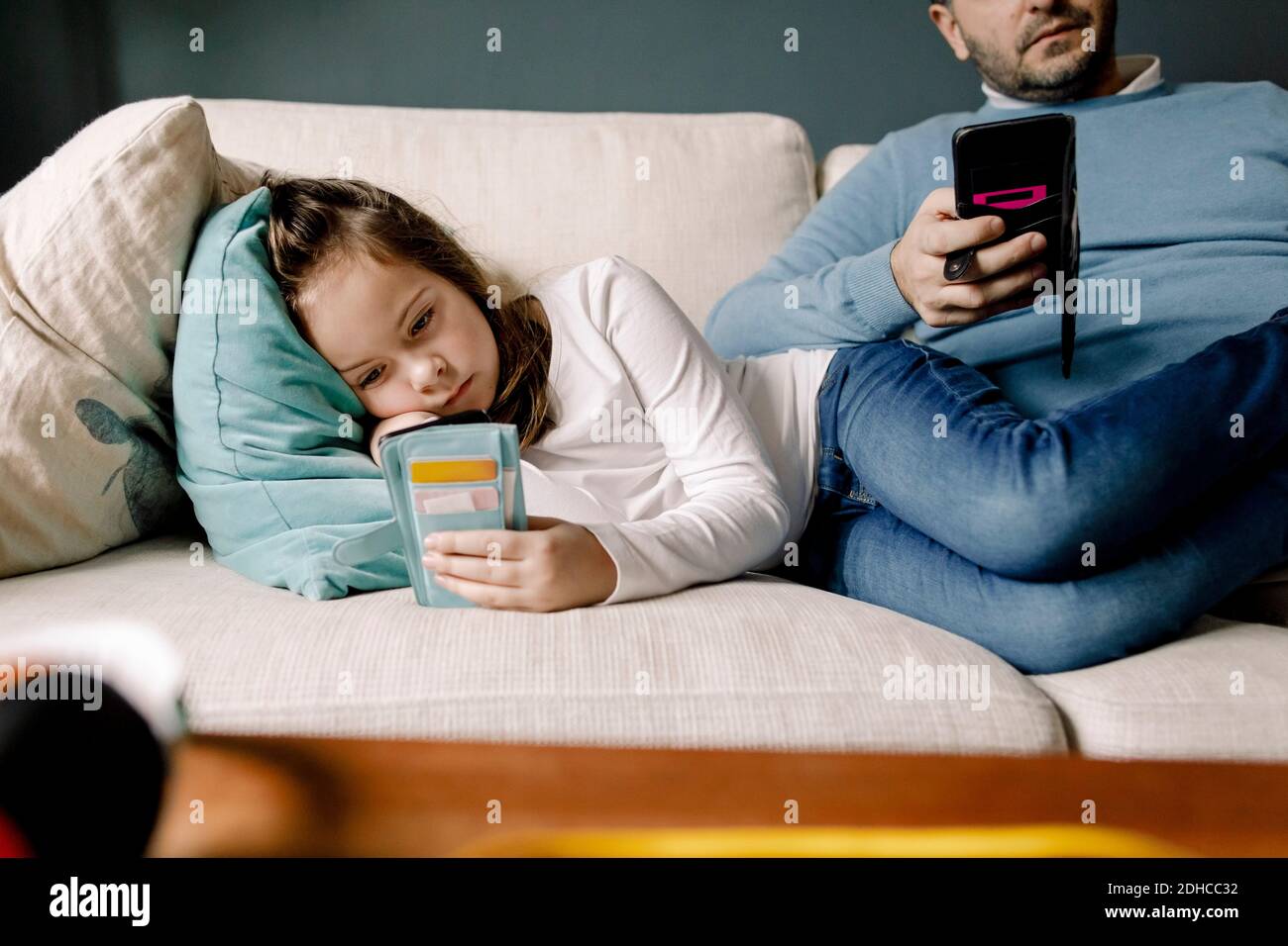 Men child mobile phones hi-res stock photography and images - Alamy