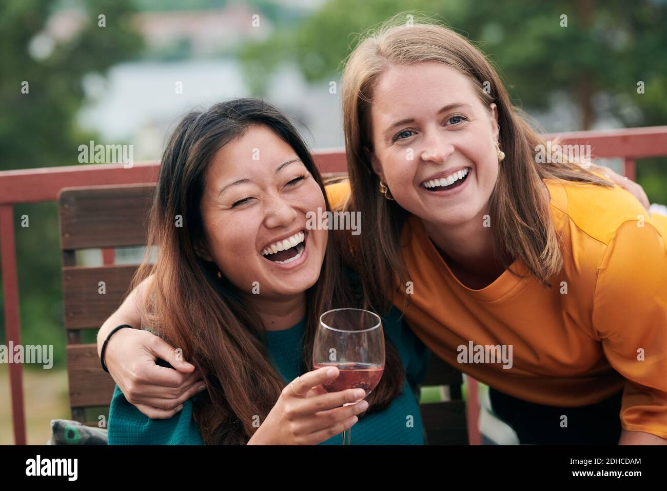 Two cheerful asian friends hi-res stock photography and images - Alamy