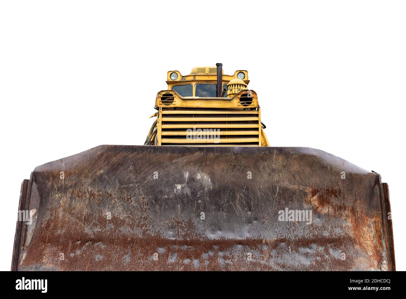 Front view of big bucket old rusty huge heavy bulldozer loader tread or ...