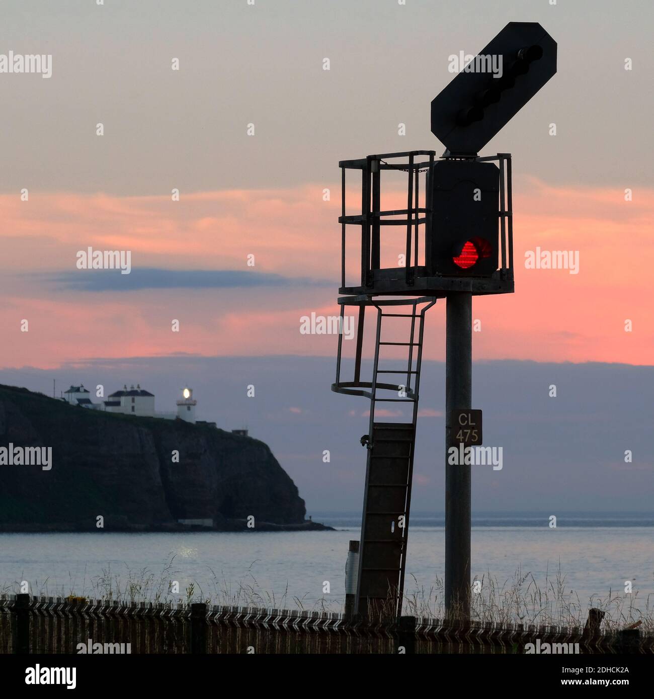 Railway signal & Blackhead lighthouse, Whitehead, County Antrim Stock ...