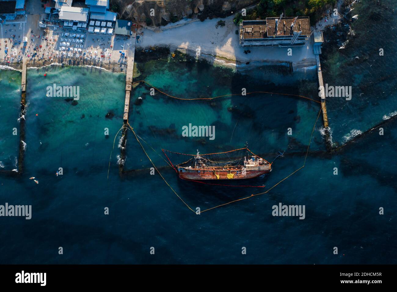 Top view of an old tanker that ran aground and overturned Stock Photo ...
