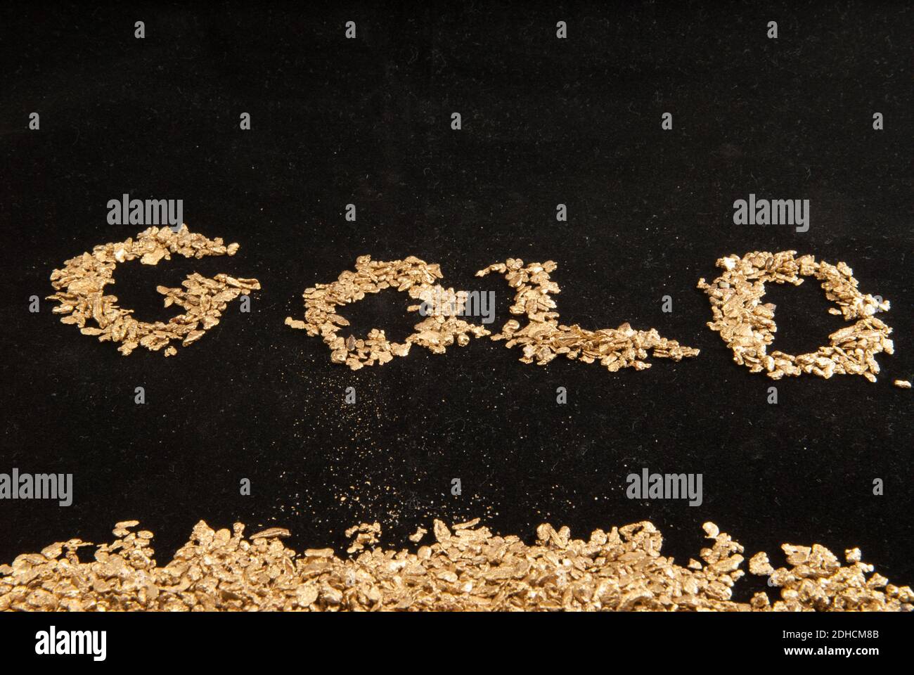 large samples of pure gold in various forms including coins, ingots ...