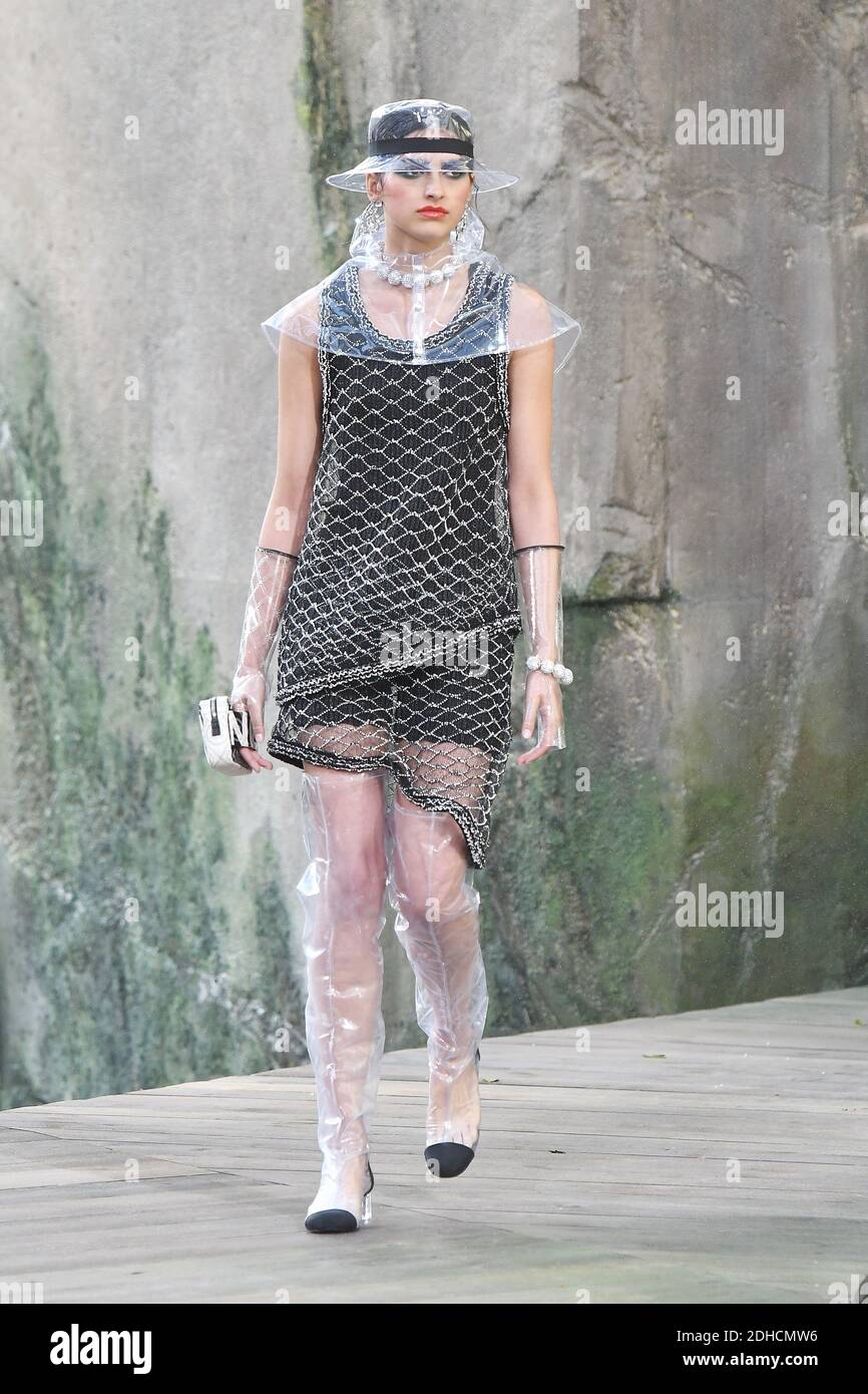 A model displays a creation designed by Karl Lagerfeld during the ...